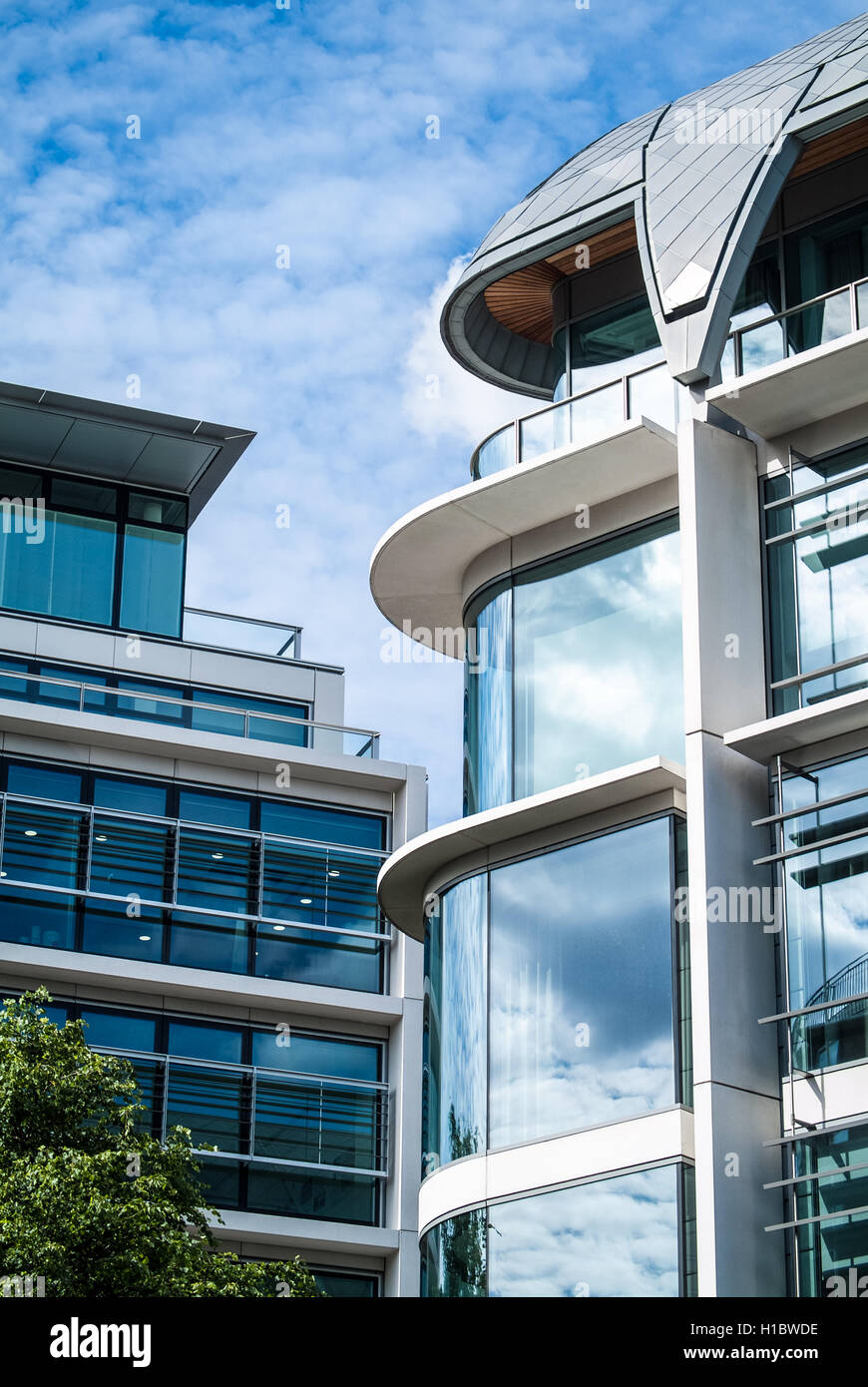 photo of a modern building against bright blue sky Stock Photo - Alamy