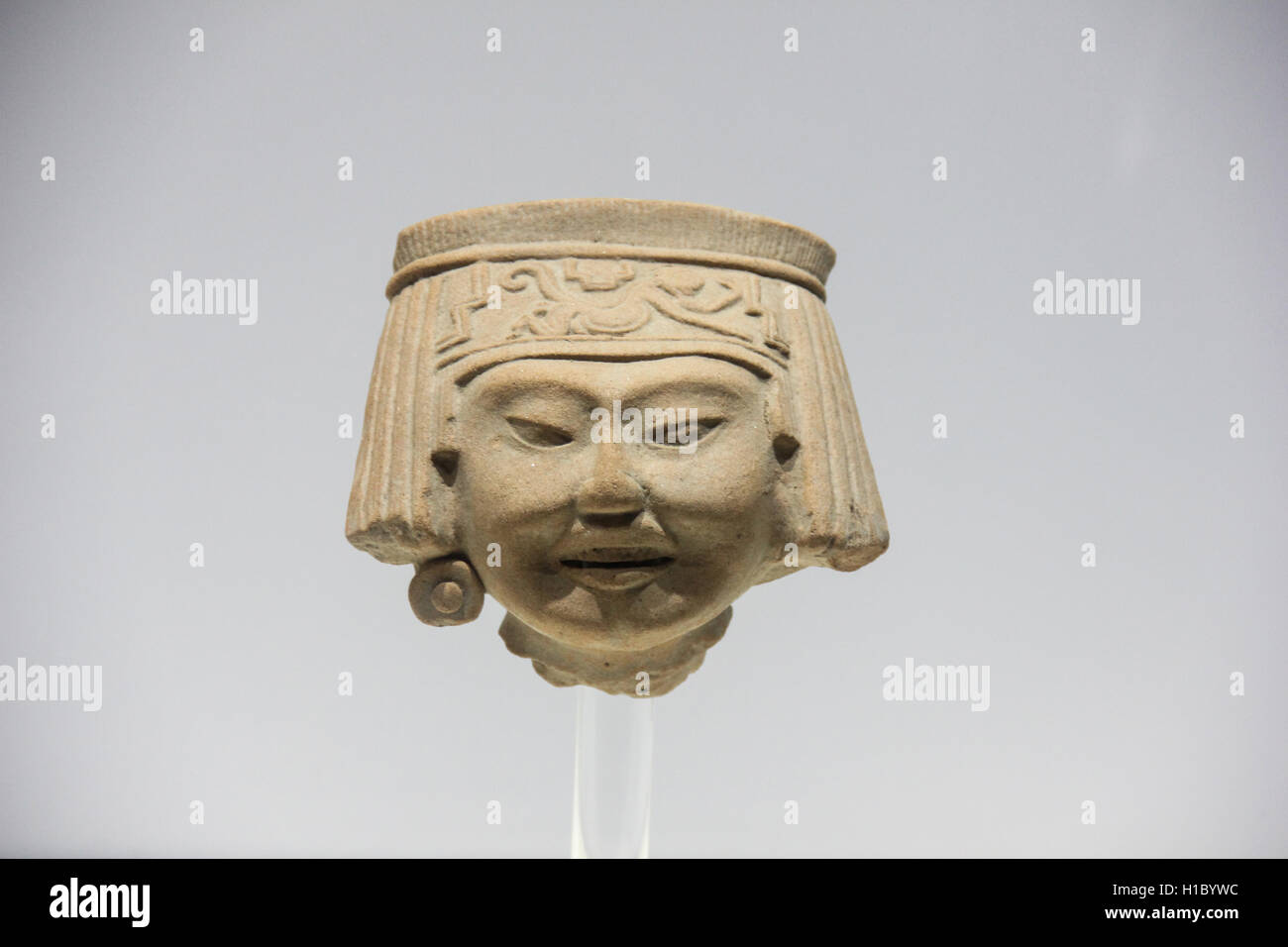 Statues with representations of smiling faces on display at the ...