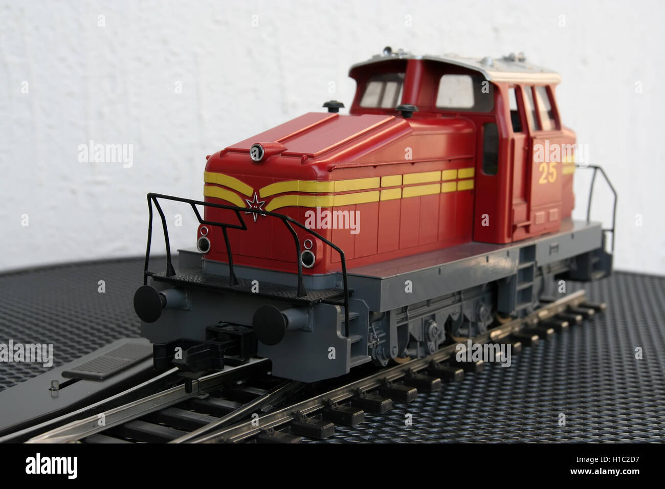 Red Locomotive miniature model. Red locomotive toy model Stock Photo ...