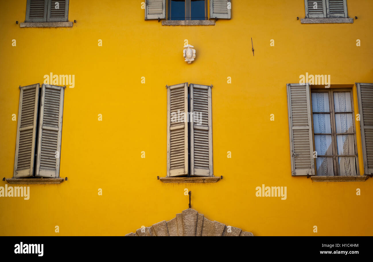 bright yellow facade photographed in Italy Stock Photo - Alamy