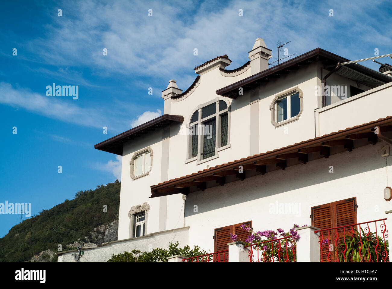 beautiful Italian house against bright blue sky Stock Photo - Alamy