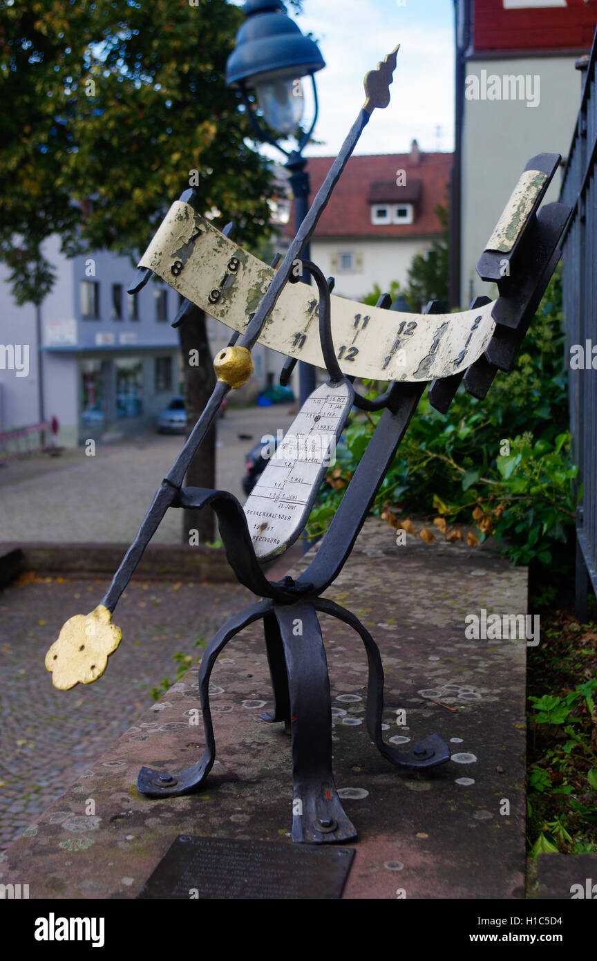 rustical sun clock outside in a park. Sundial in Germany Stock Photo ...