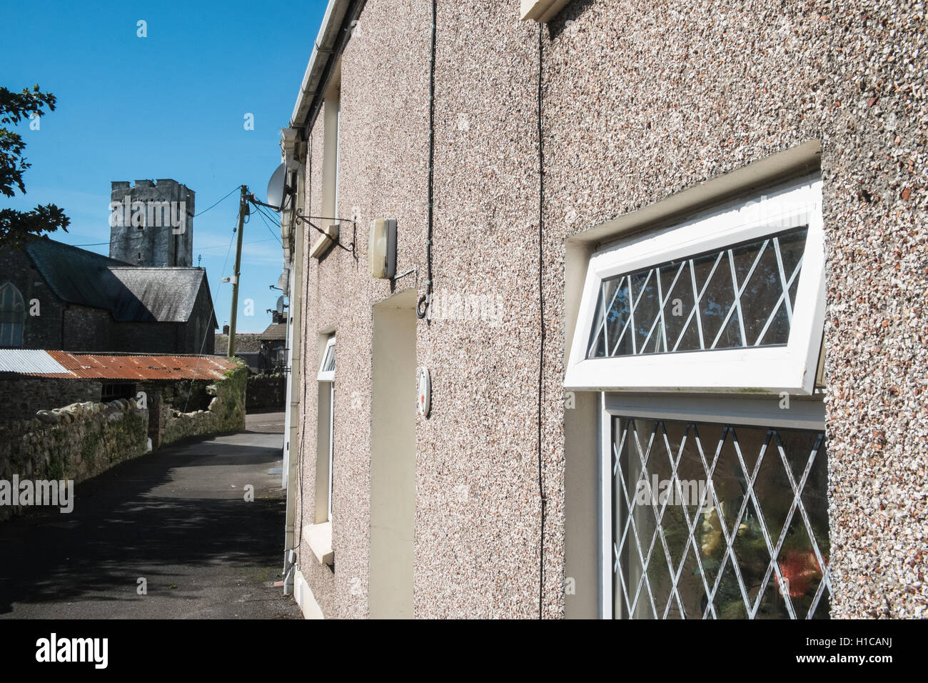 Pebble dashed walls of terraced houses,cottages in centre of hilltop ...