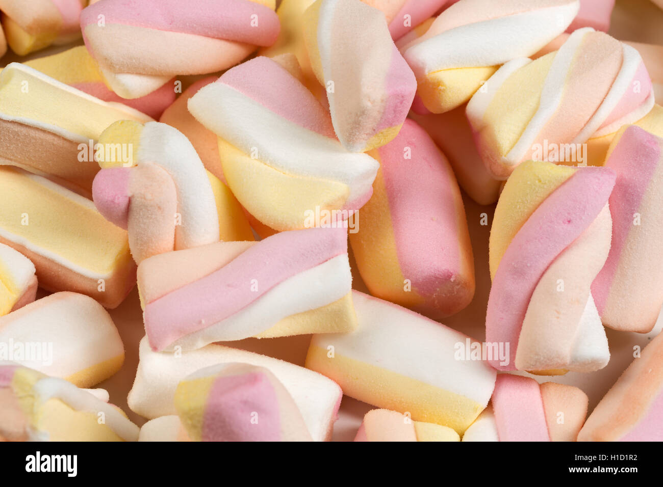 Background of the chewy sweets. Isolate on white Stock Photo - Alamy