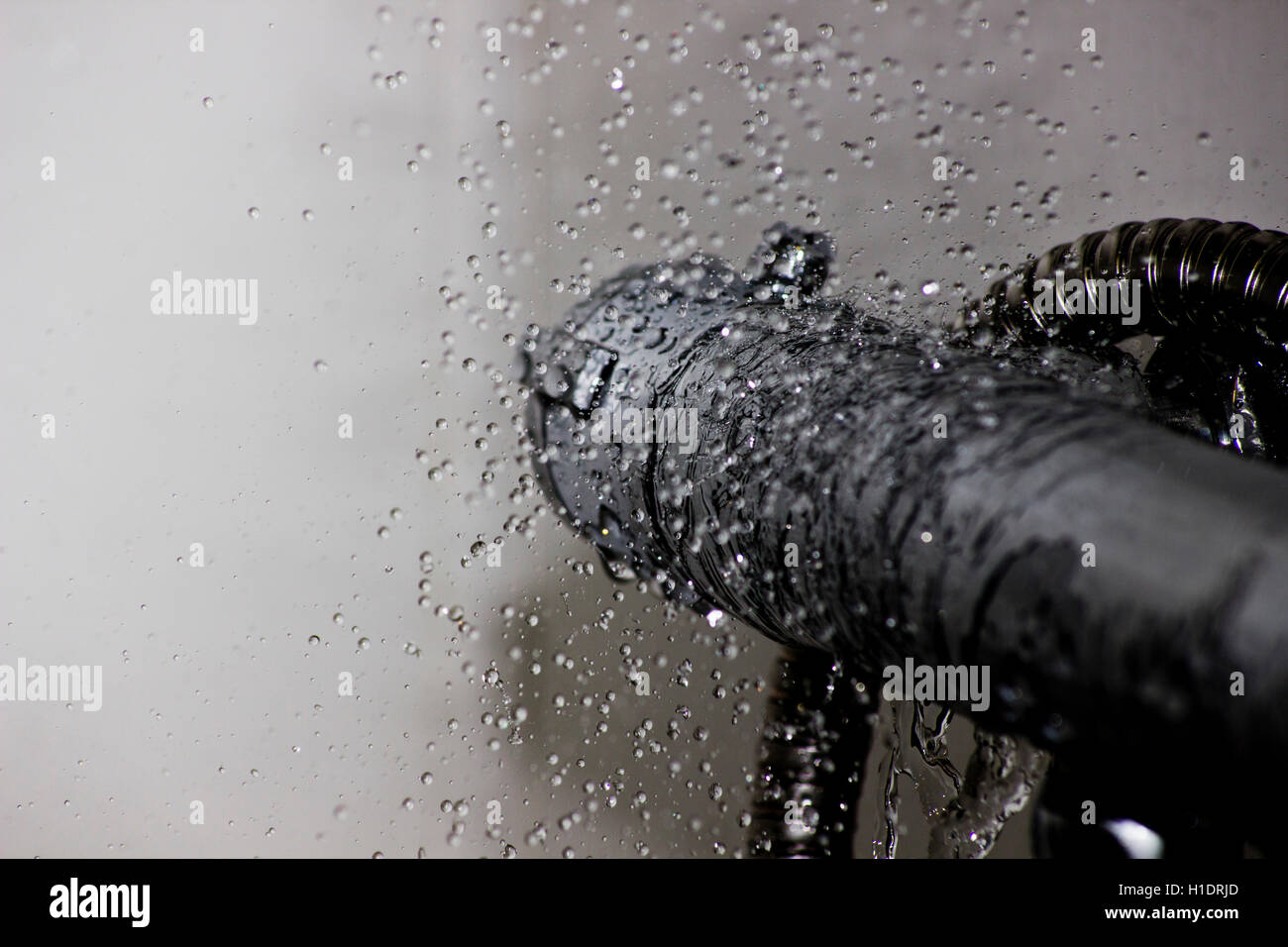 Shower water droplets on taps Stock Photo - Alamy