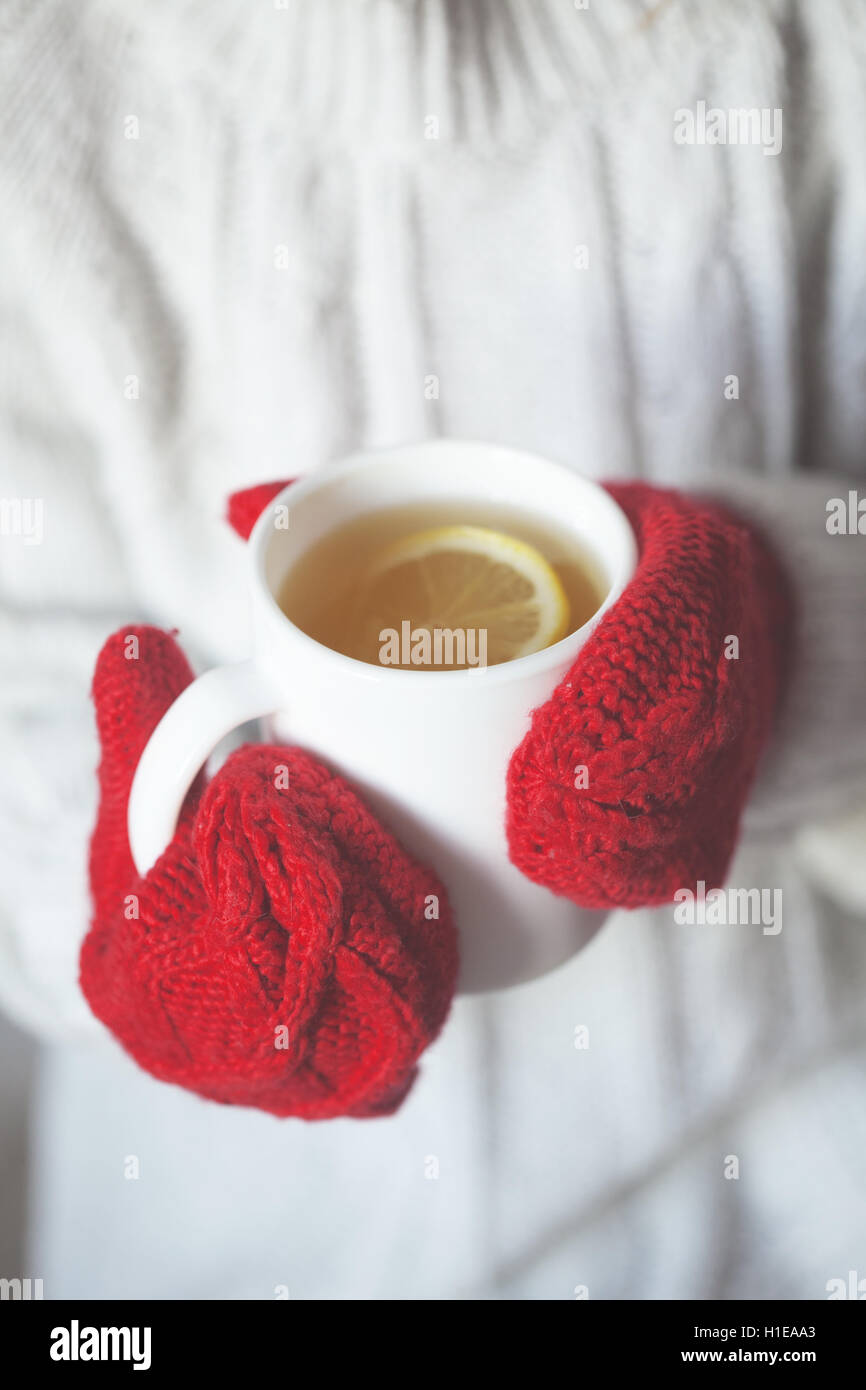 Hands with cup of tea Stock Photo - Alamy