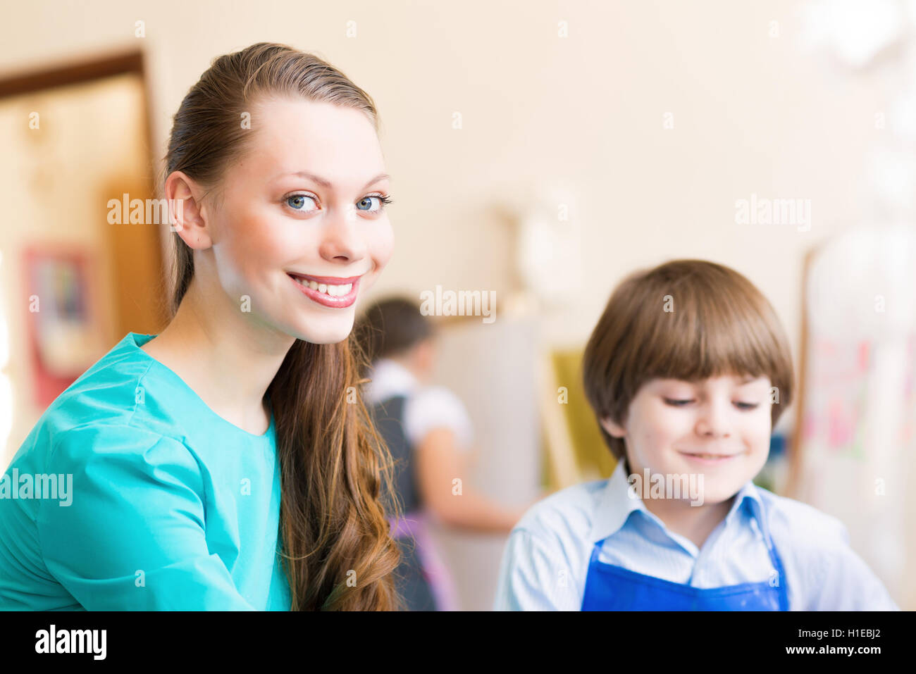 teacher and student in the classroom Stock Photo - Alamy
