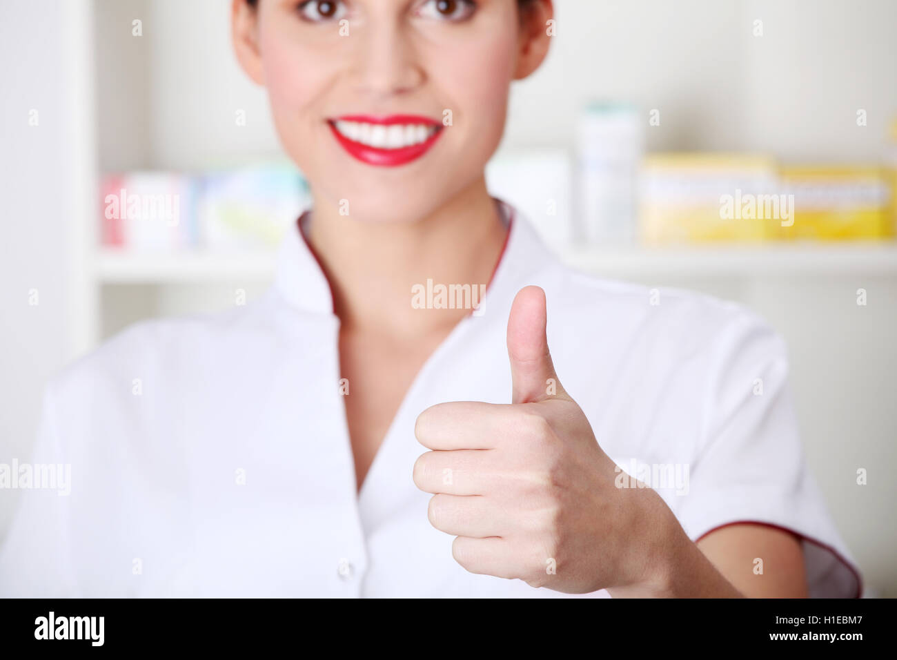 Young nurse, doctor showing ok gesture Stock Photo - Alamy