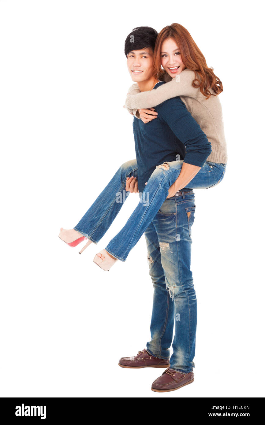 full length young couple standing and hugging Stock Photo - Alamy