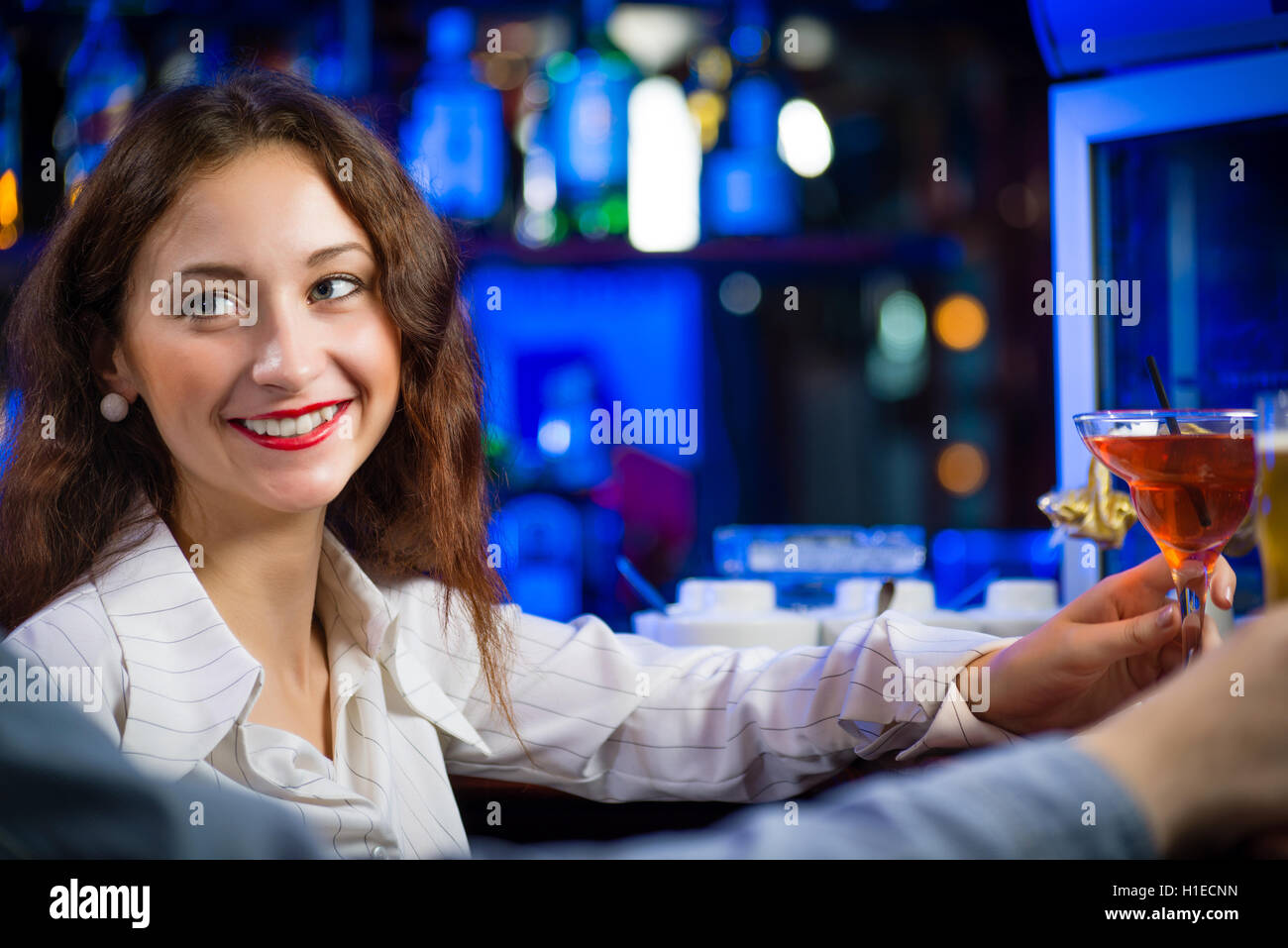 young woman in a bar Stock Photo - Alamy