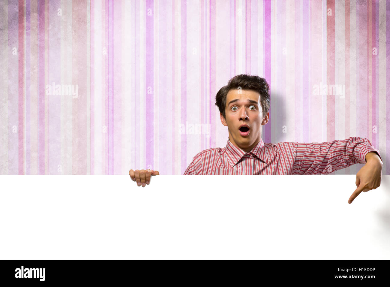 man holding a banner Stock Photo - Alamy