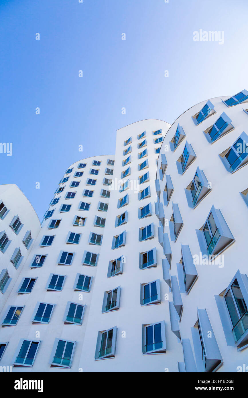 white house with blue windows, modern architecture Stock Photo - Alamy
