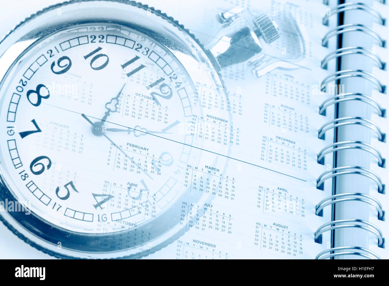 Watch on calendar diary page Stock Photo - Alamy