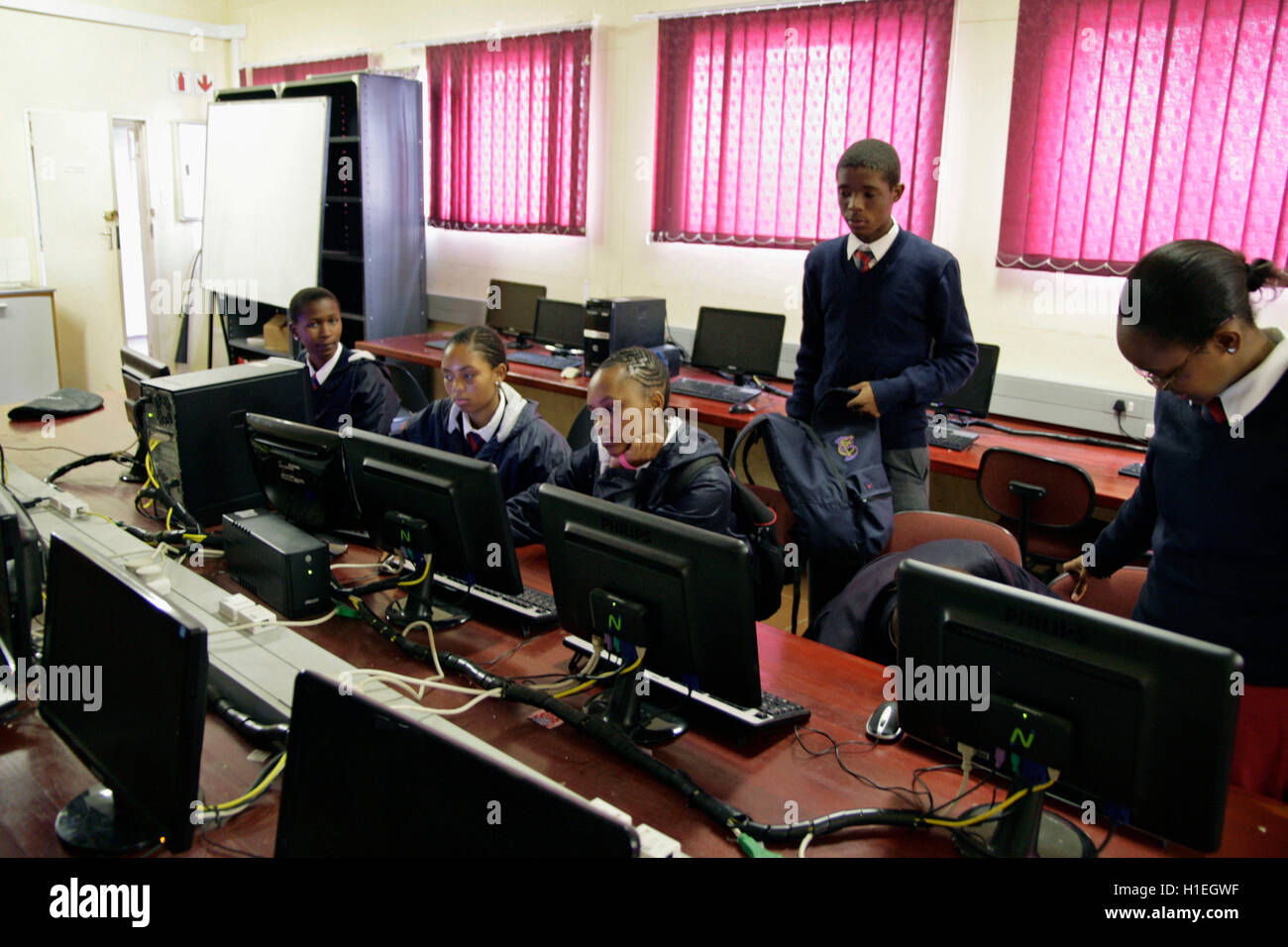 Children working on computers in computer classroom, St Mark's School ...