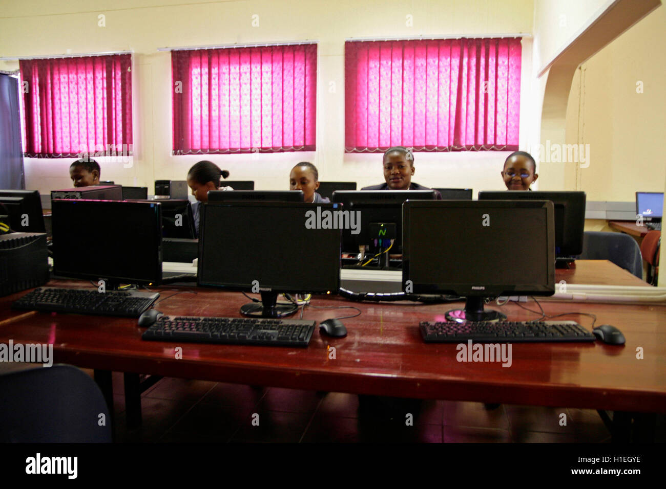 Children working on computers in computer classroom, St Mark's School ...