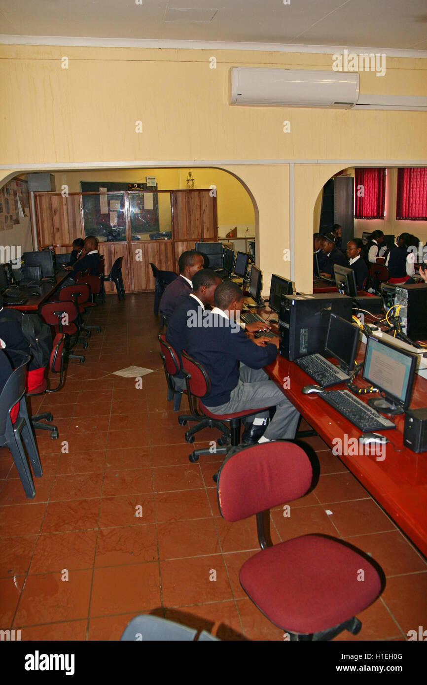 Children working on computers in computer classroom, St Mark's School ...