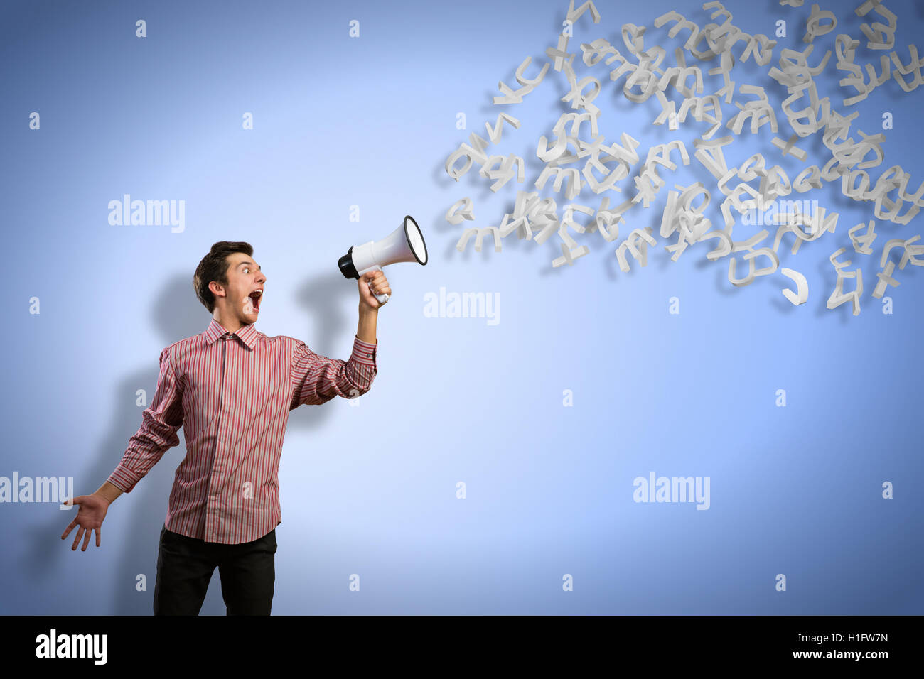 man yells into a megaphone Stock Photo - Alamy