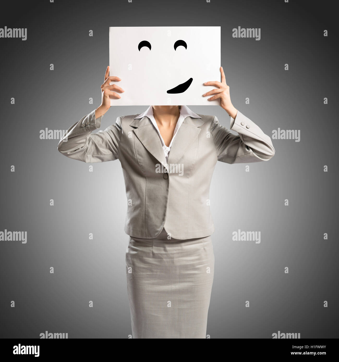 business woman holding a poster Stock Photo - Alamy