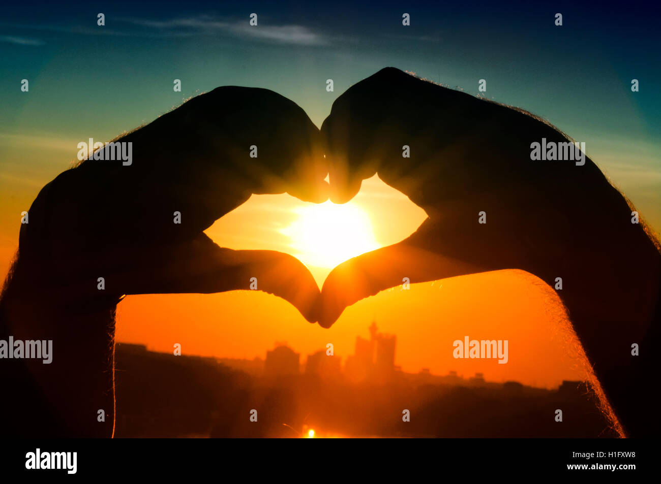 Hand and sun Stock Photo - Alamy