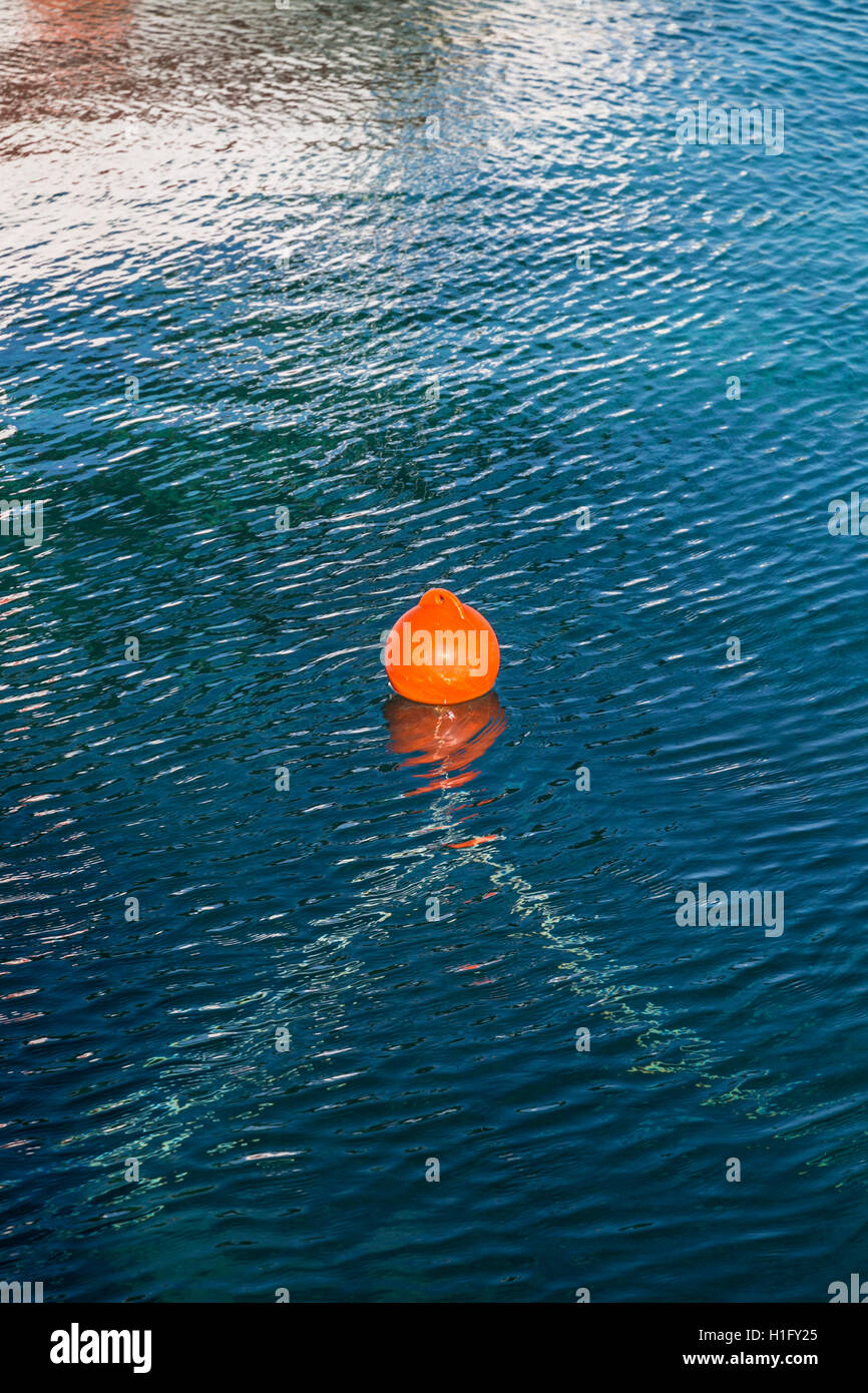 orange buoy in blue ocean water Stock Photo - Alamy orange buoy in blue ocean water Stock Photo - Alamy