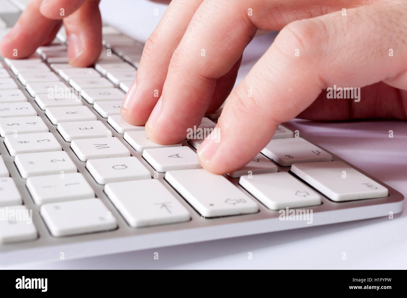 Hands on keyboard Stock Photo - Alamy