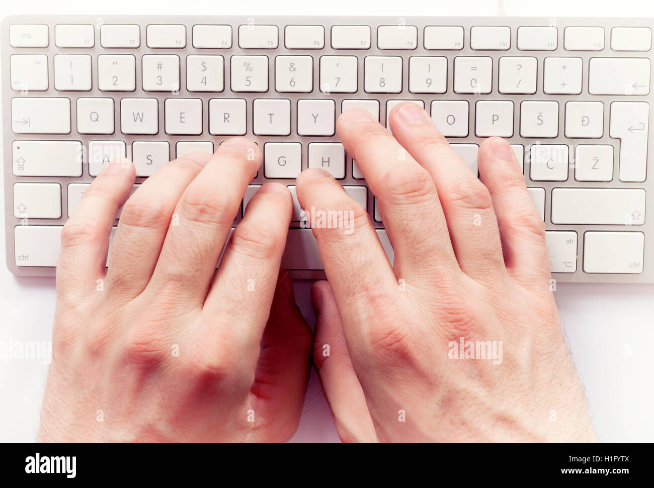 Hands on keyboard Stock Photo - Alamy
