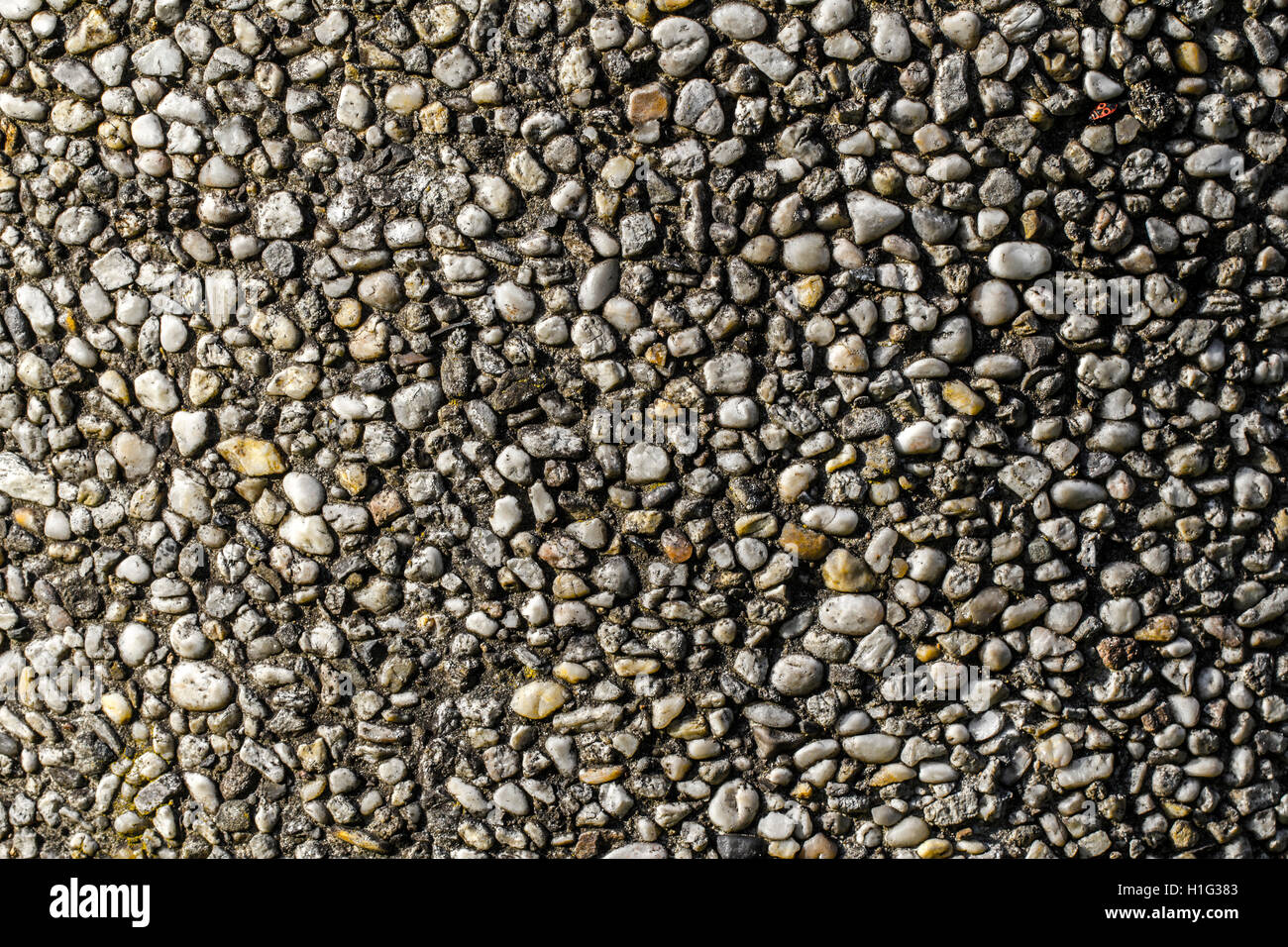 Old pebble stone wall pattern closeup Stock Photo - Alamy