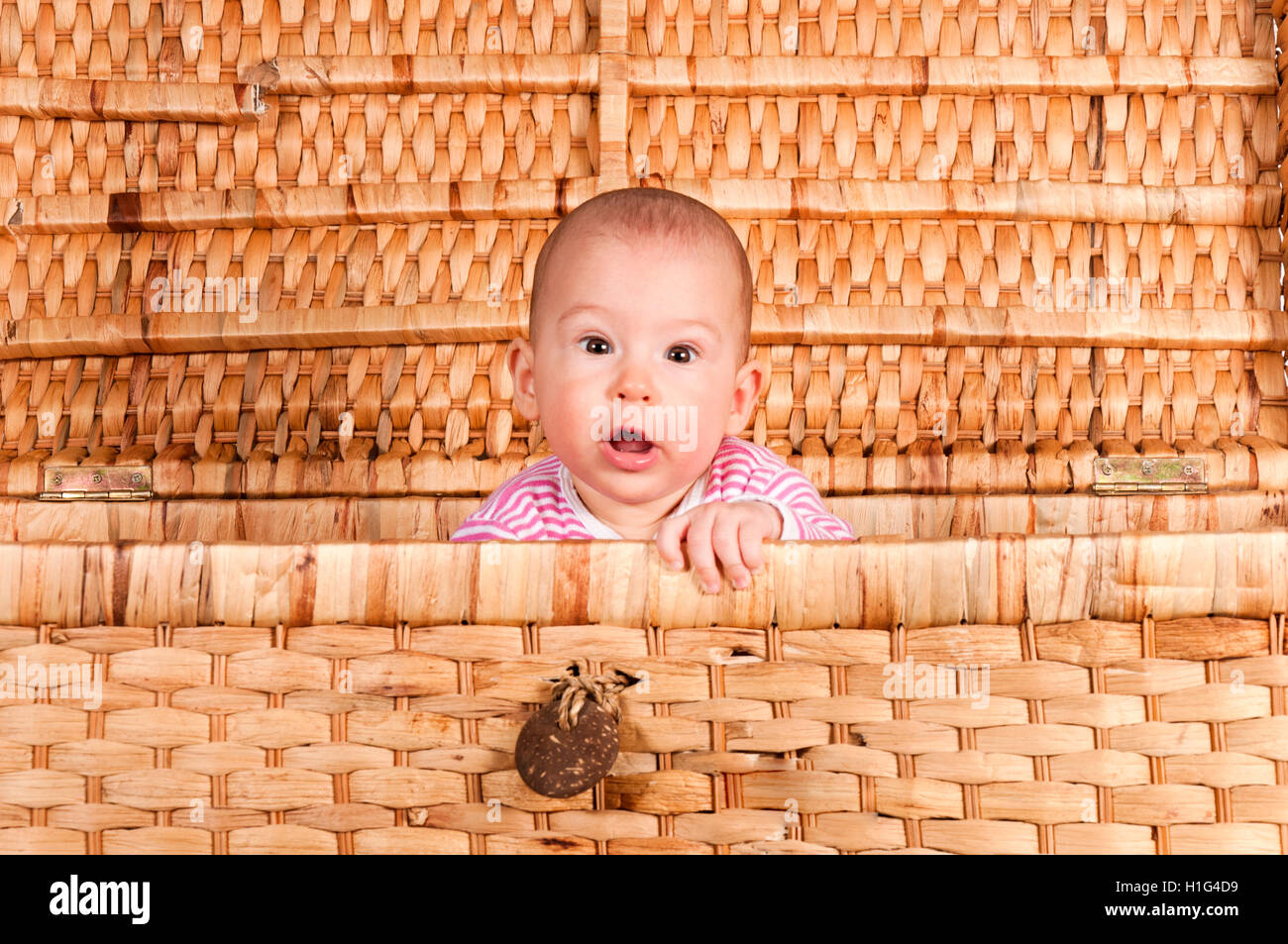 Cute confused baby girl hi-res stock photography and images - Alamy