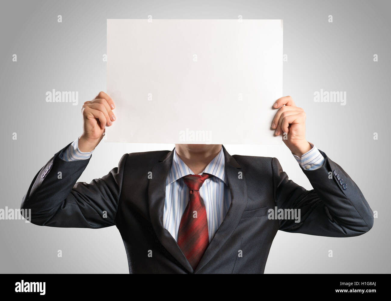 business man holding a poster Stock Photo - Alamy