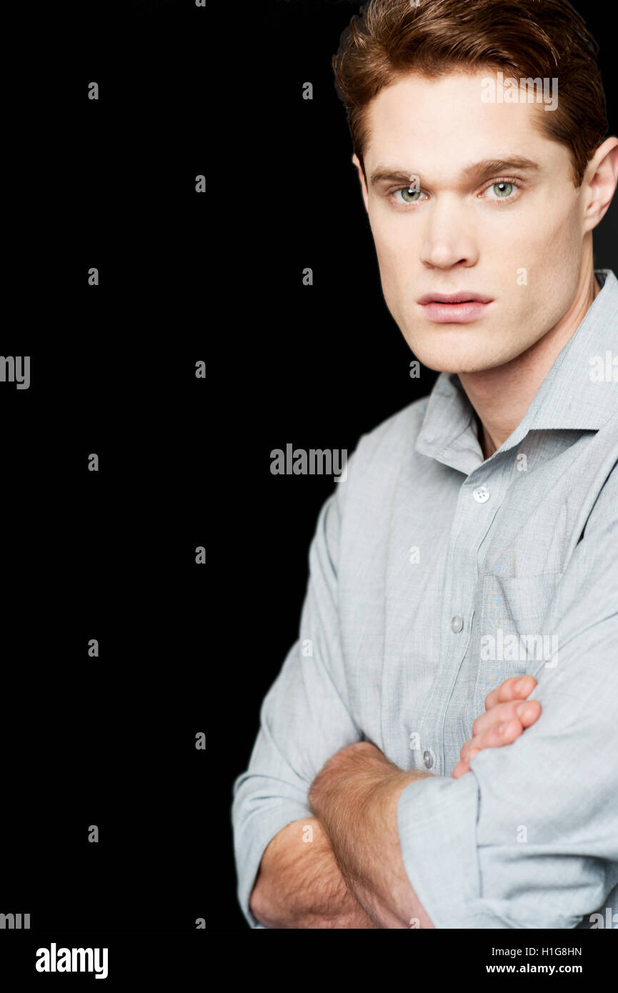 Confident young smart guy Stock Photo - Alamy