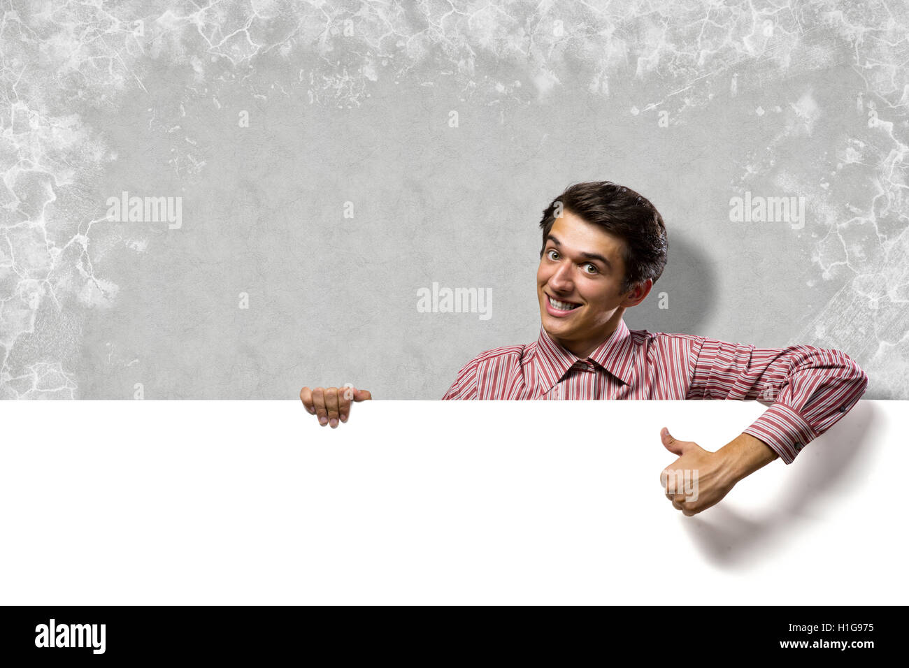 man holding a banner Stock Photo - Alamy