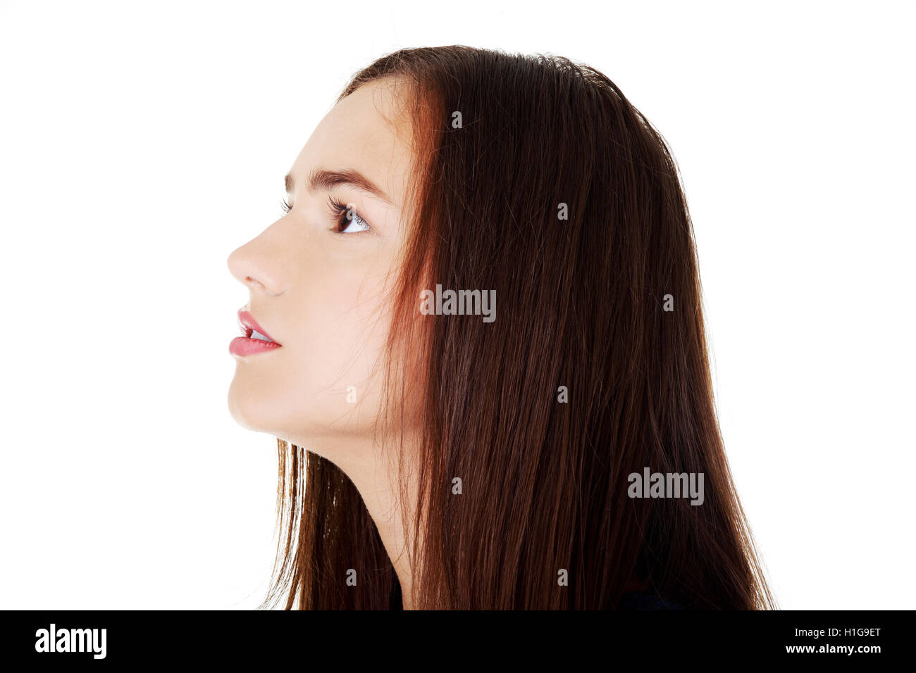 Profile of beautiful woman looking up Stock Photo - Alamy