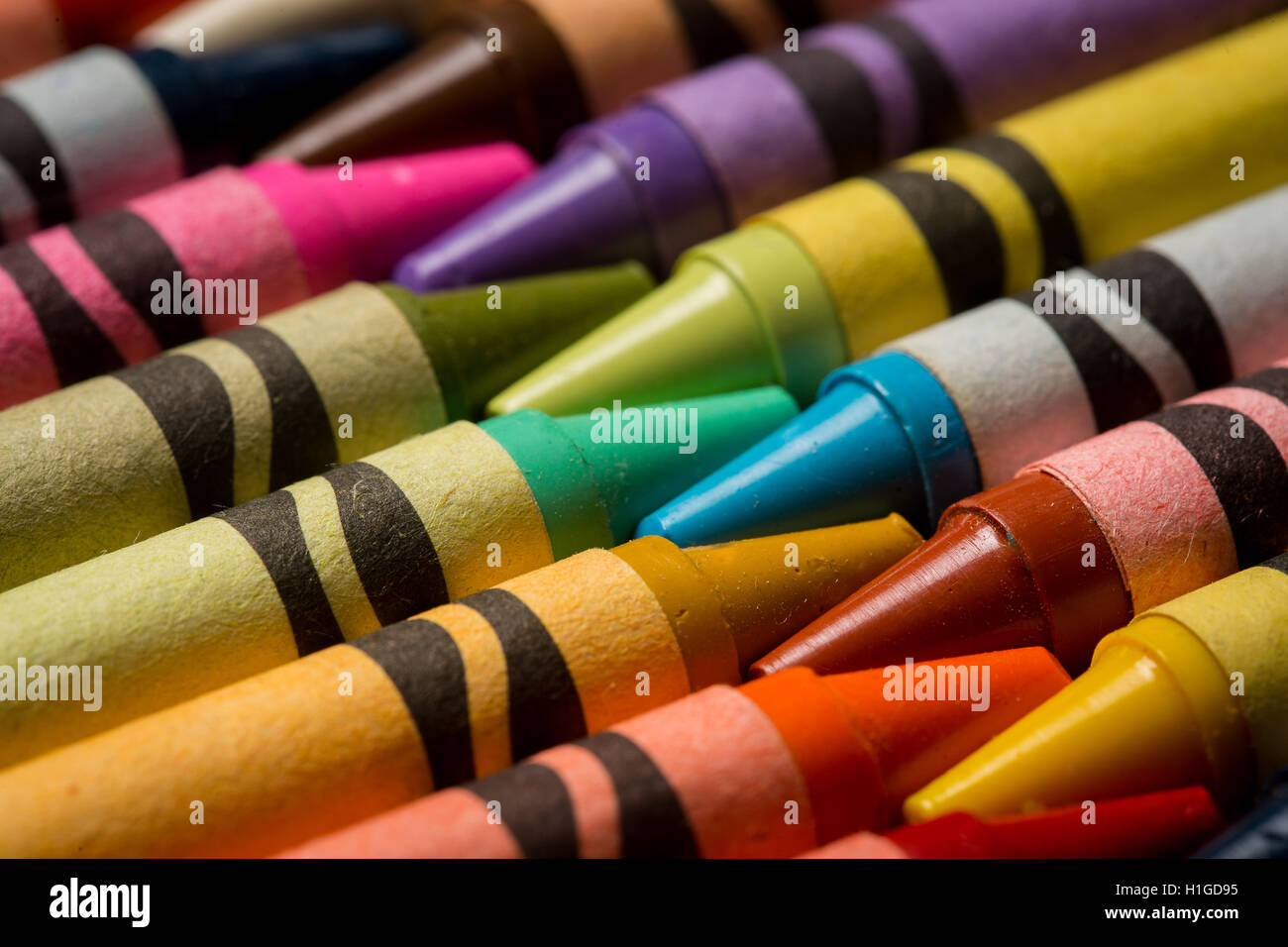 Two rows of alternating crayons fitted together. A mix of multiple ...