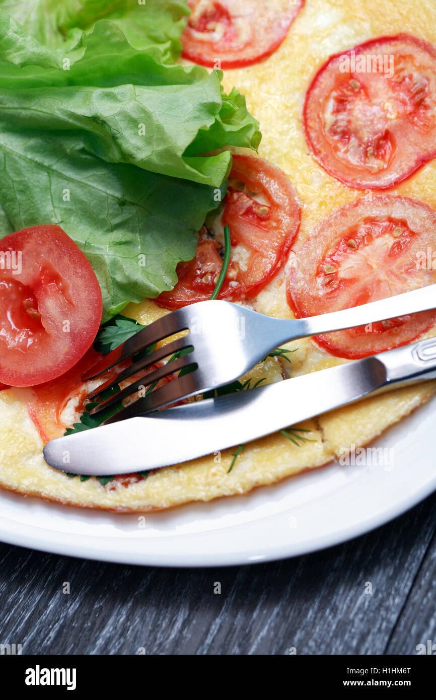 Omelet With Tomatoes Stock Photo - Alamy