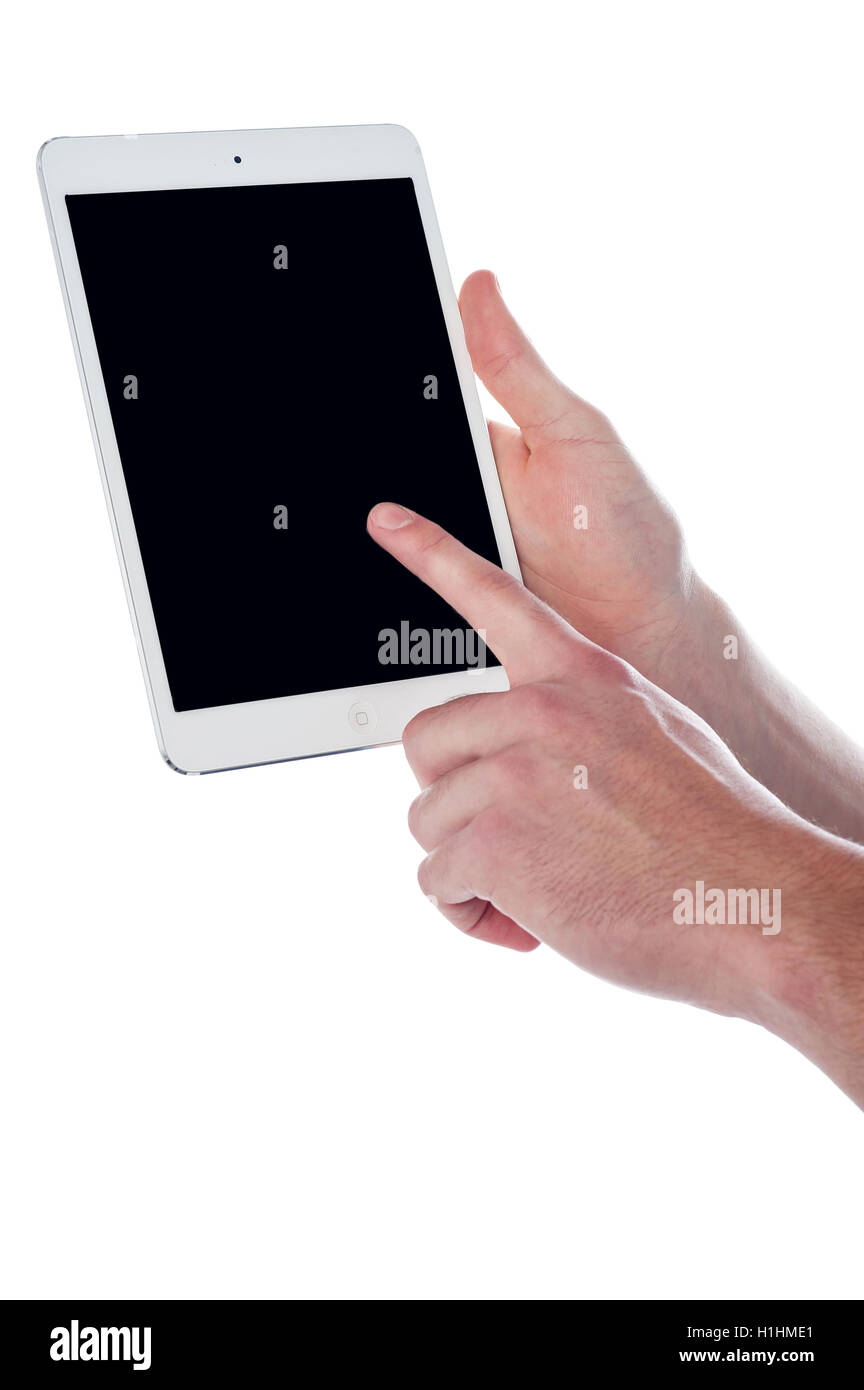 Finger pointing on device Cut Out Stock Images & Pictures - Alamy