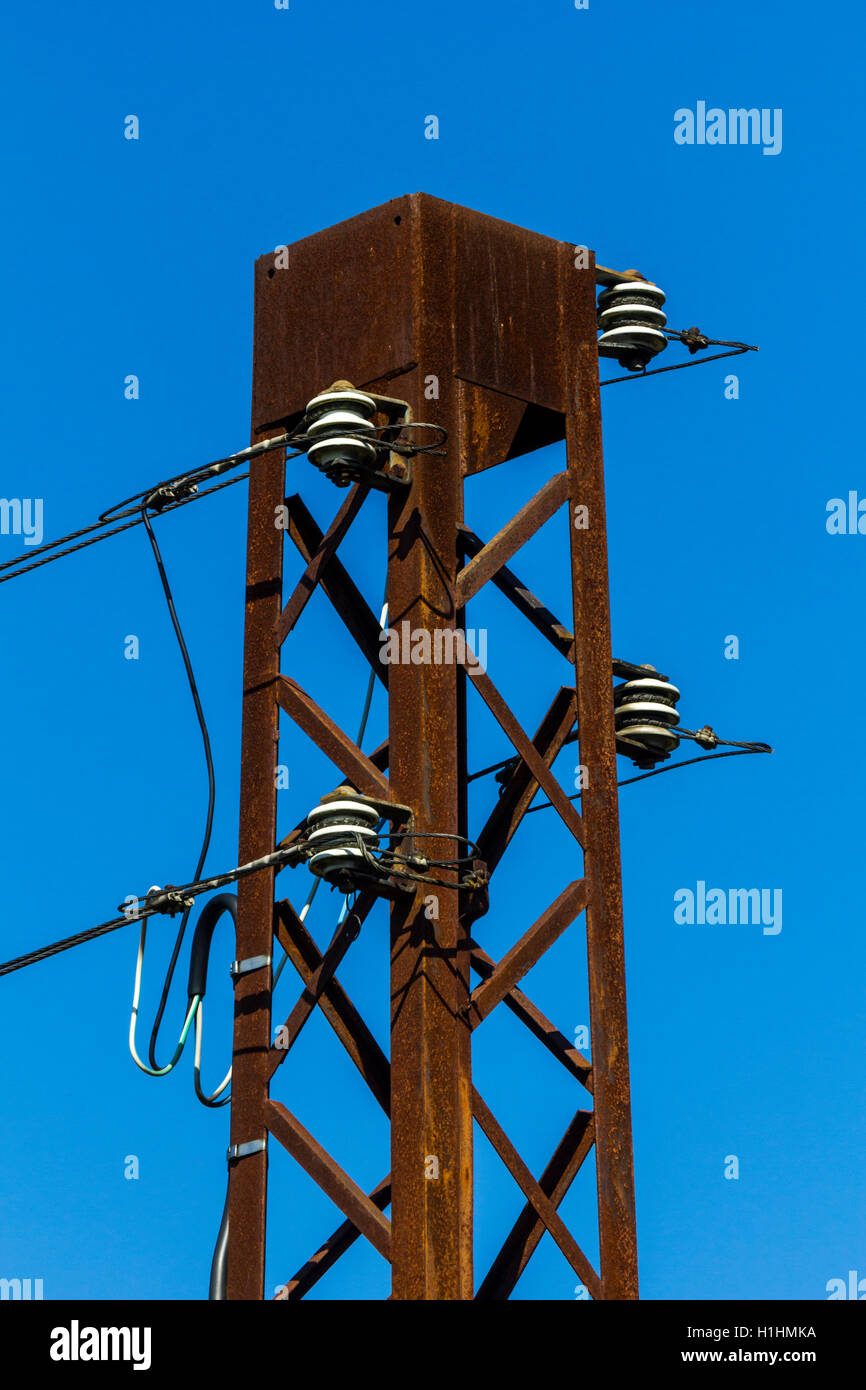 Old rusty top of an electrical tower Stock Photo - Alamy