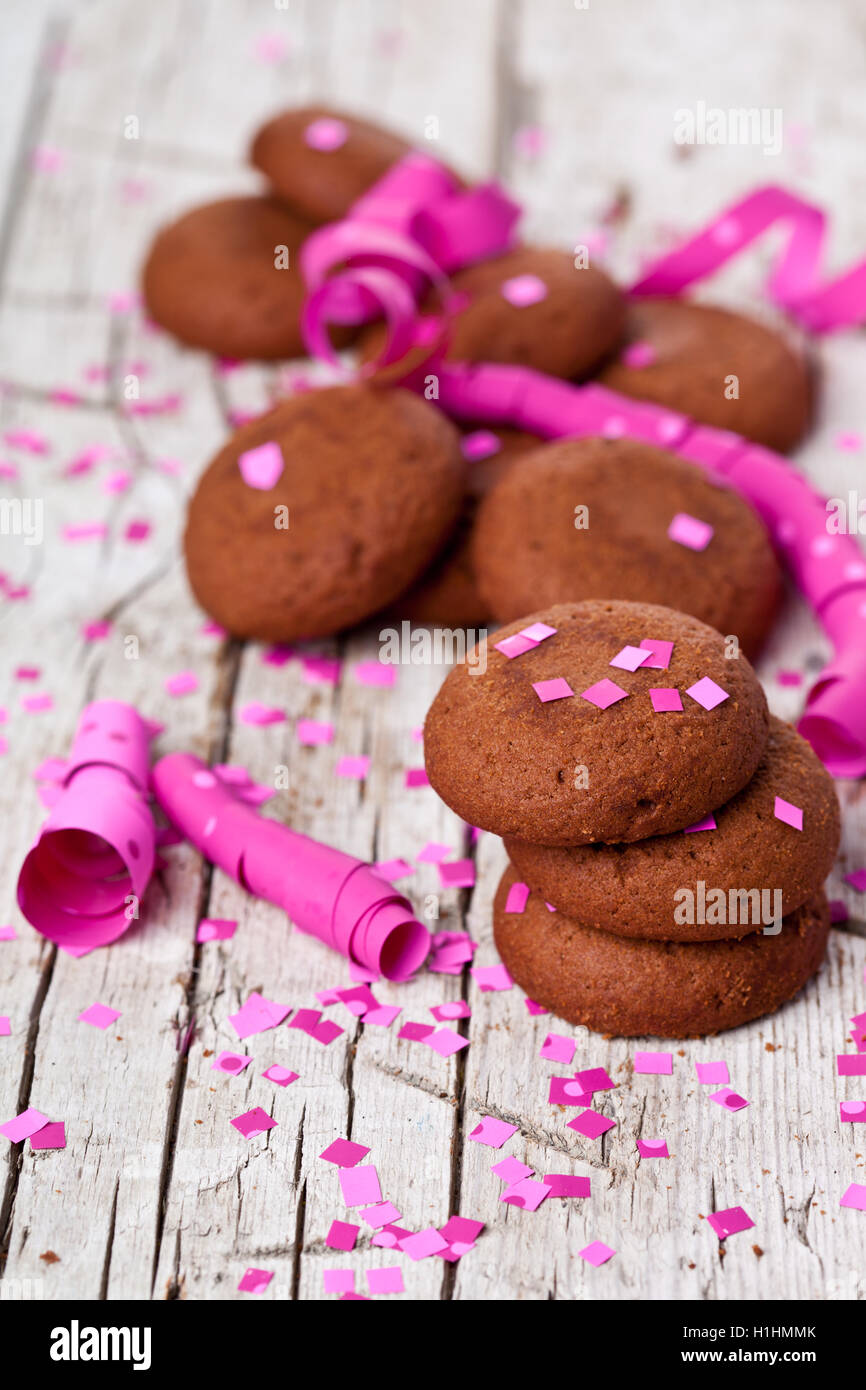 fresh chocolate cookies, coffee beans, pink ribbons and confetti Stock ...
