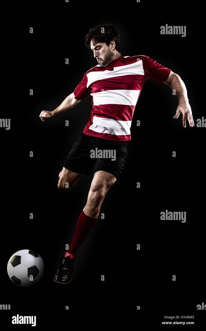 One man soccer play red hi-res stock photography and images - Alamy
