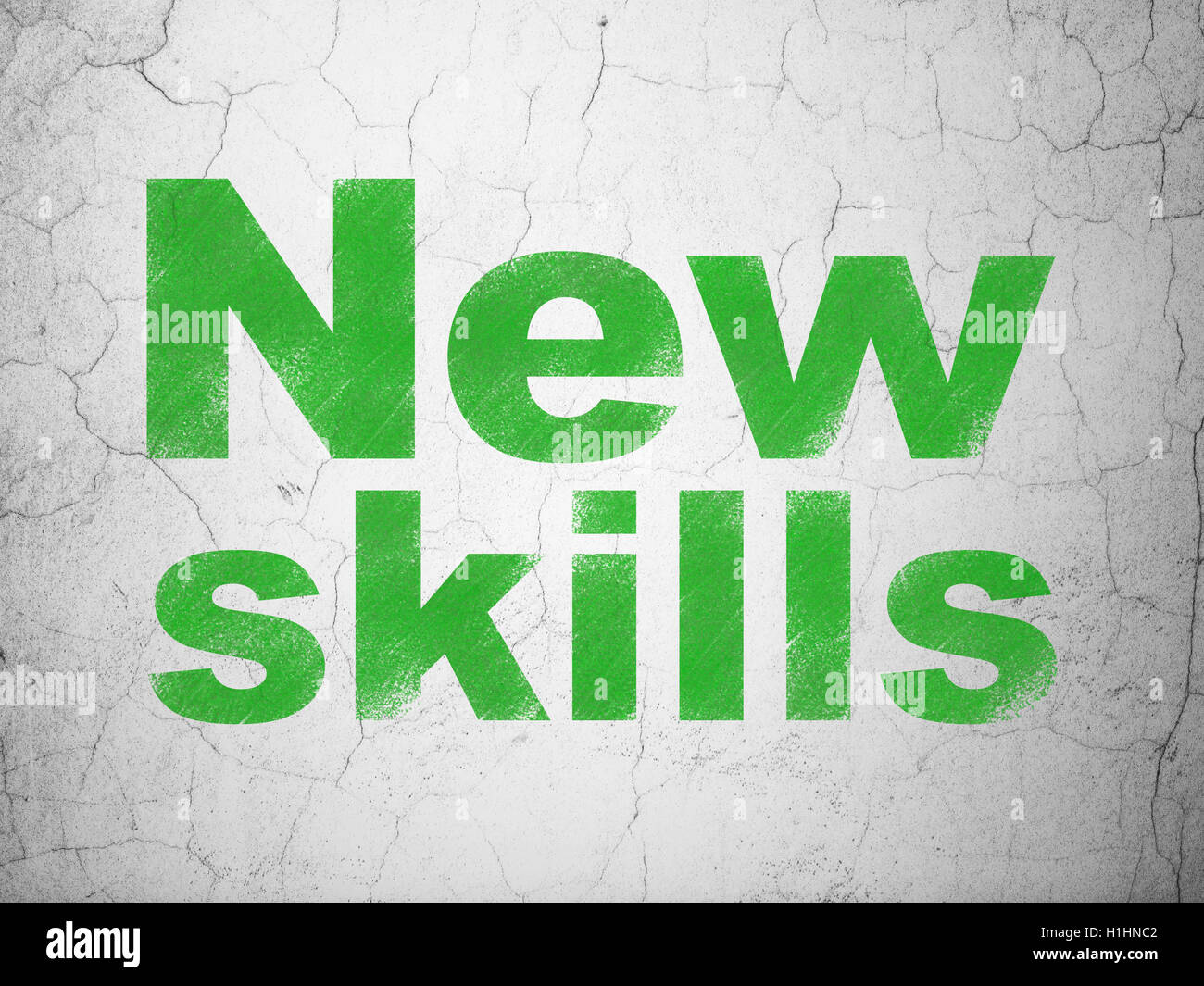 Education concept: New Skills on wall background Stock Photo - Alamy