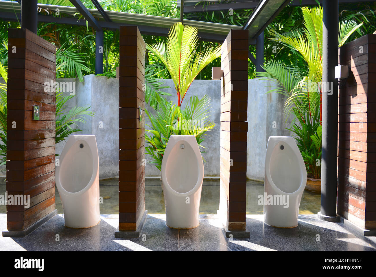Urinal with garden Stock Photo - Alamy