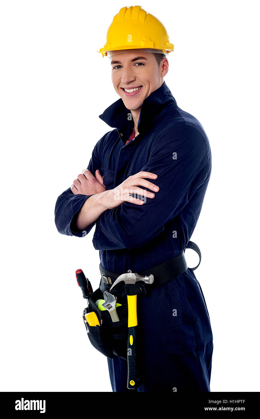 Confident young construction worker Stock Photo - Alamy