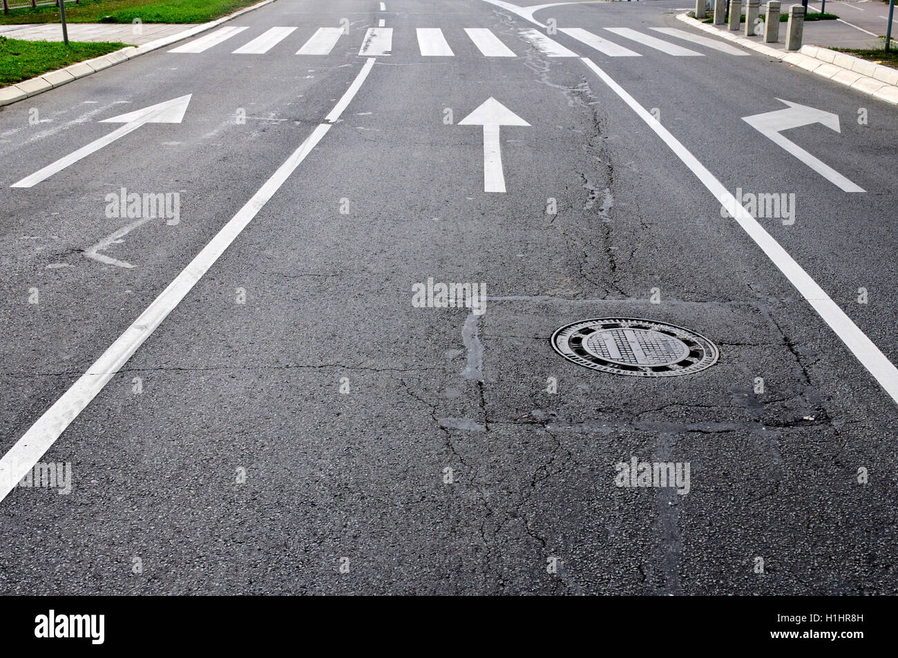 Arrows on the road Stock Photo - Alamy