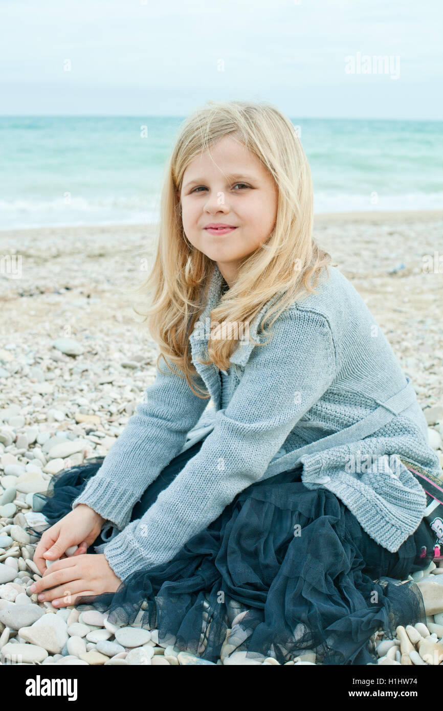 pretty girl at the autumn beach Stock Photo - Alamy