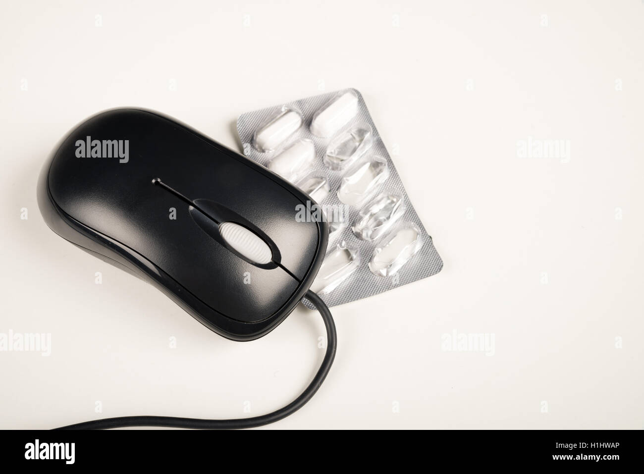 Pill blister and mouse, a concept of self medication and medicine abuse ...