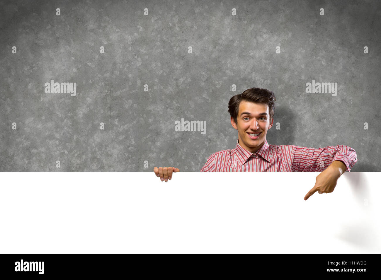 man holding a banner Stock Photo - Alamy