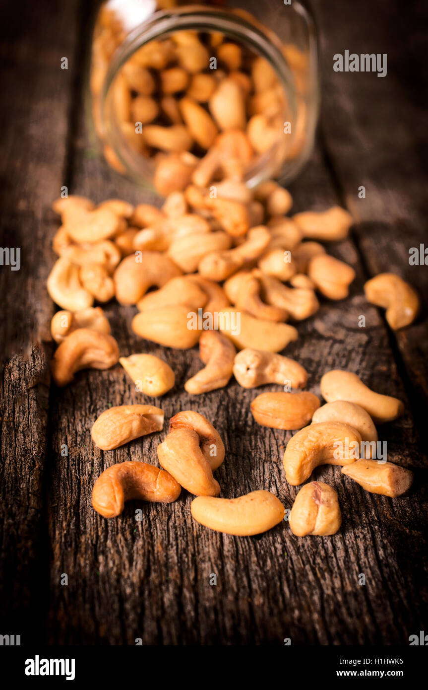 Cashew nuts splashed Stock Photo - Alamy