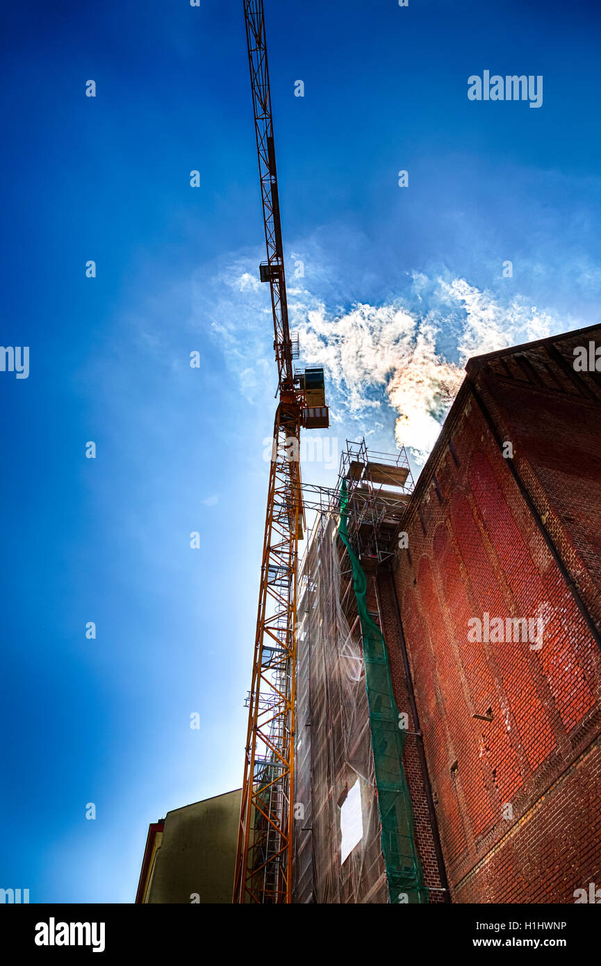 construction crane in extreme perspective Stock Photo - Alamy