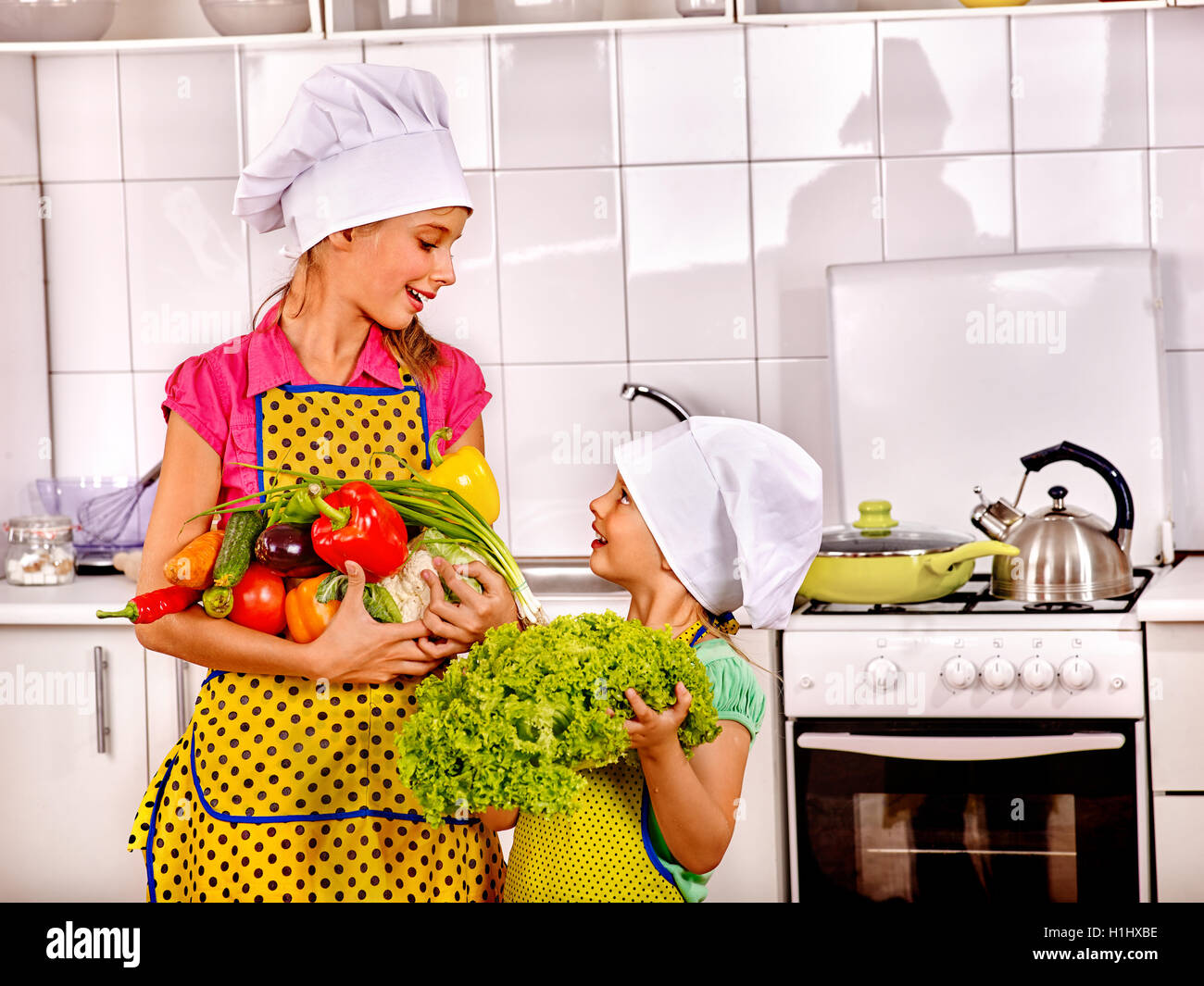 Children cooking on kitchen at home Stock Photo - Alamy