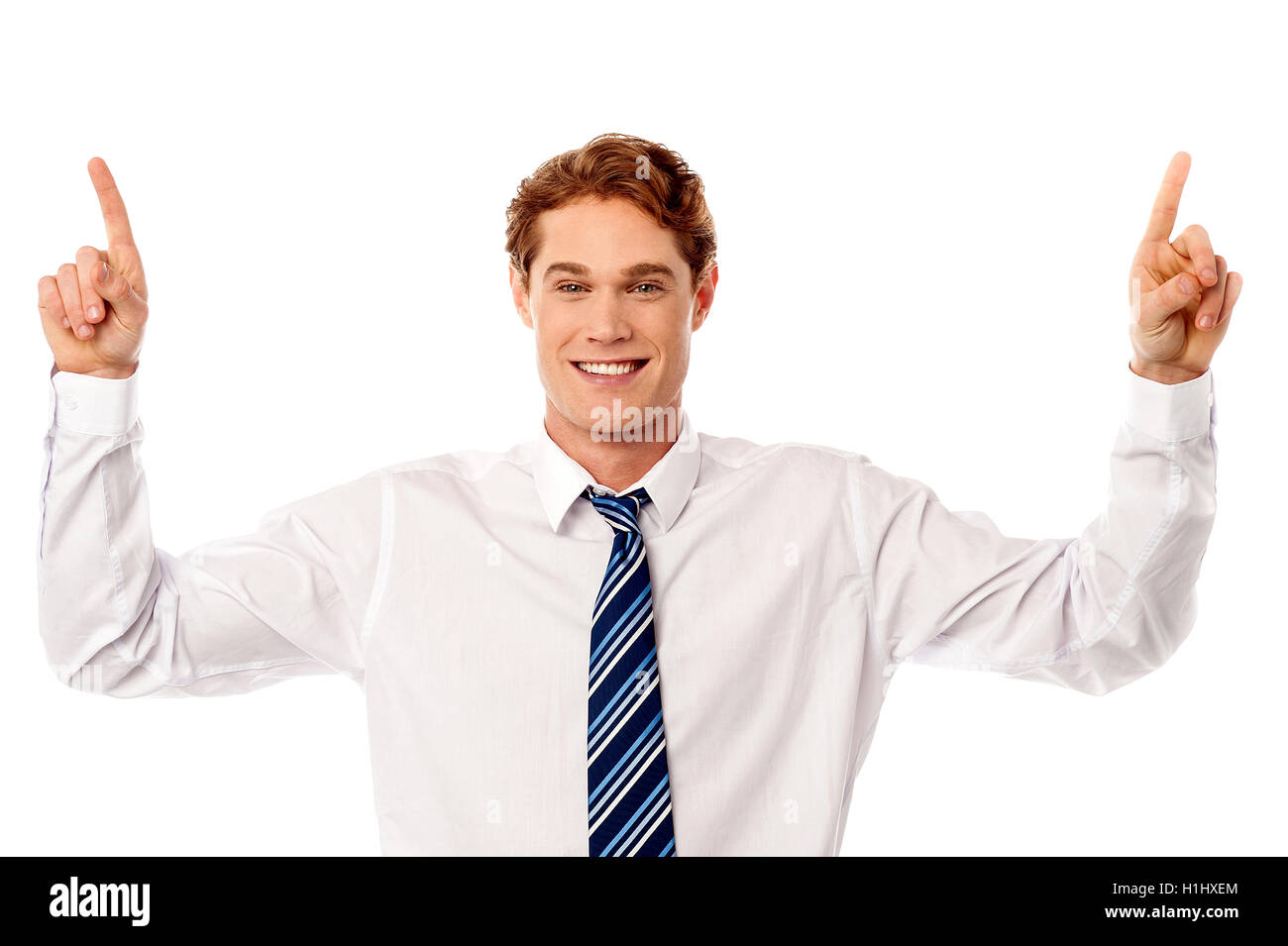 Male executive pointing upwards Stock Photo - Alamy