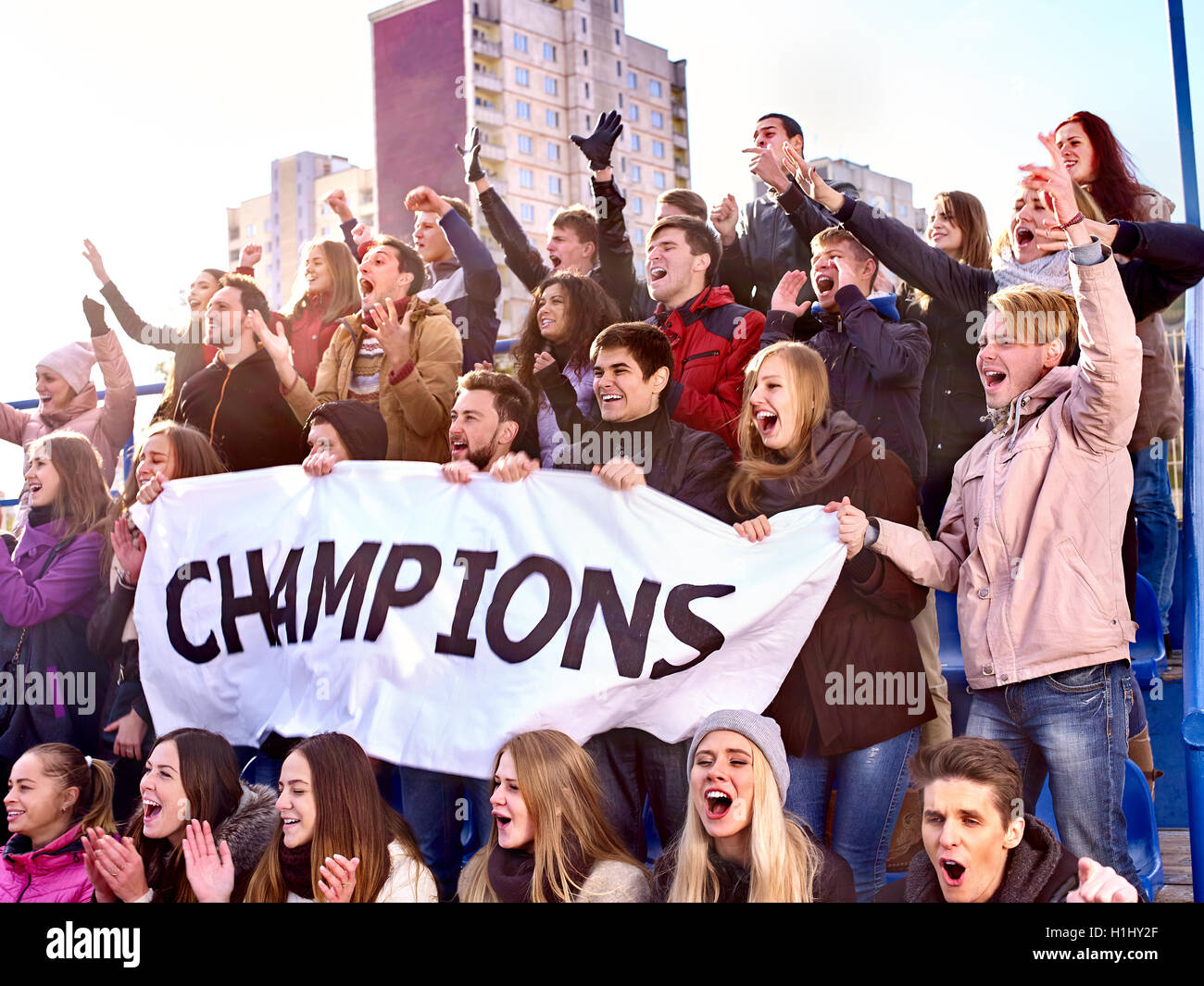 Sport fans keep champion banner on tribunes Stock Photo - Alamy